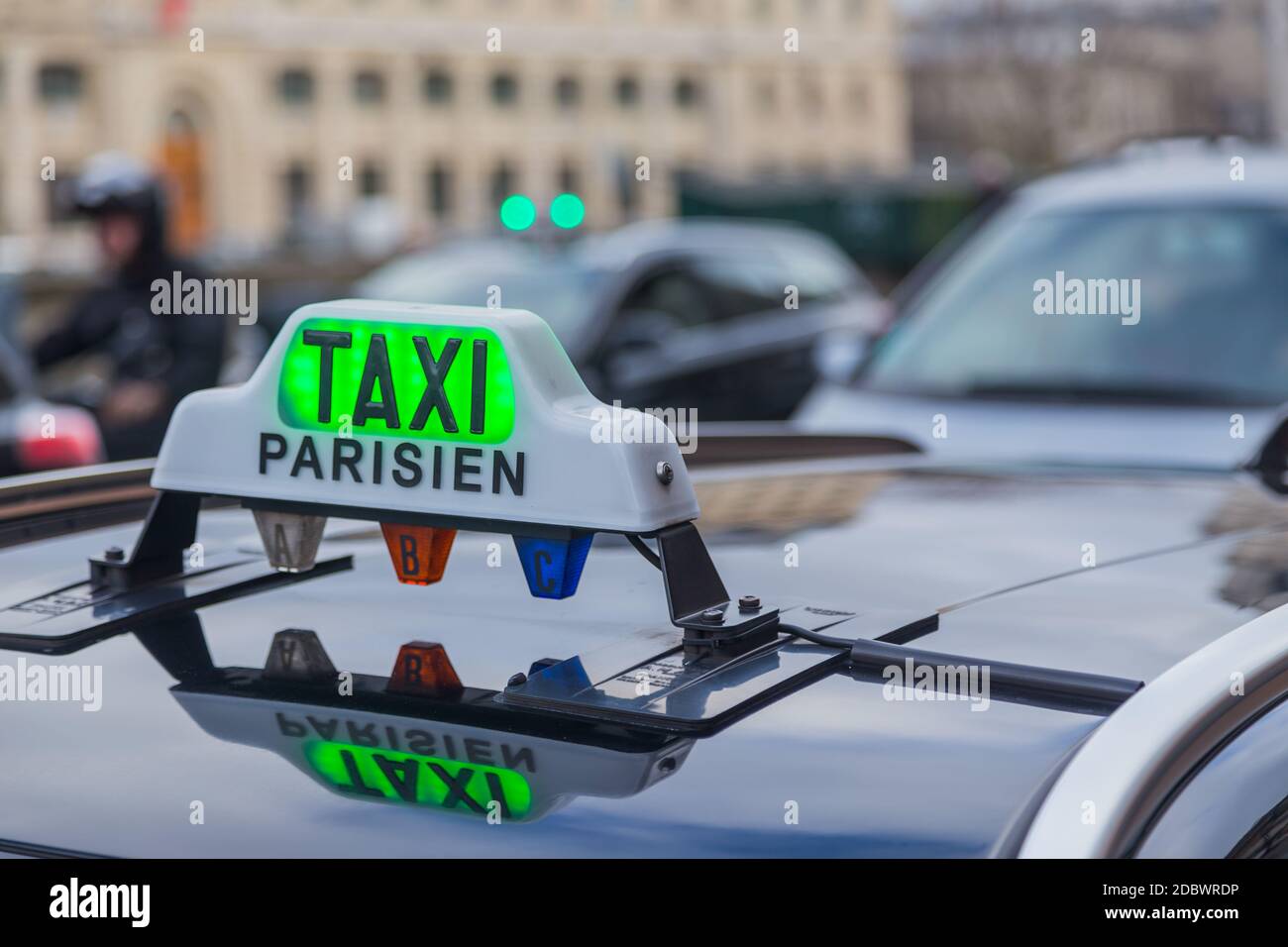 Paris Taxi sing on the roof of a transportation car in French Captial ...