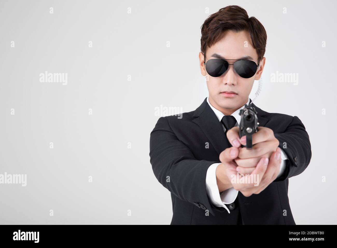 Asian male and female two security guards 088 Stock Photo - Alamy