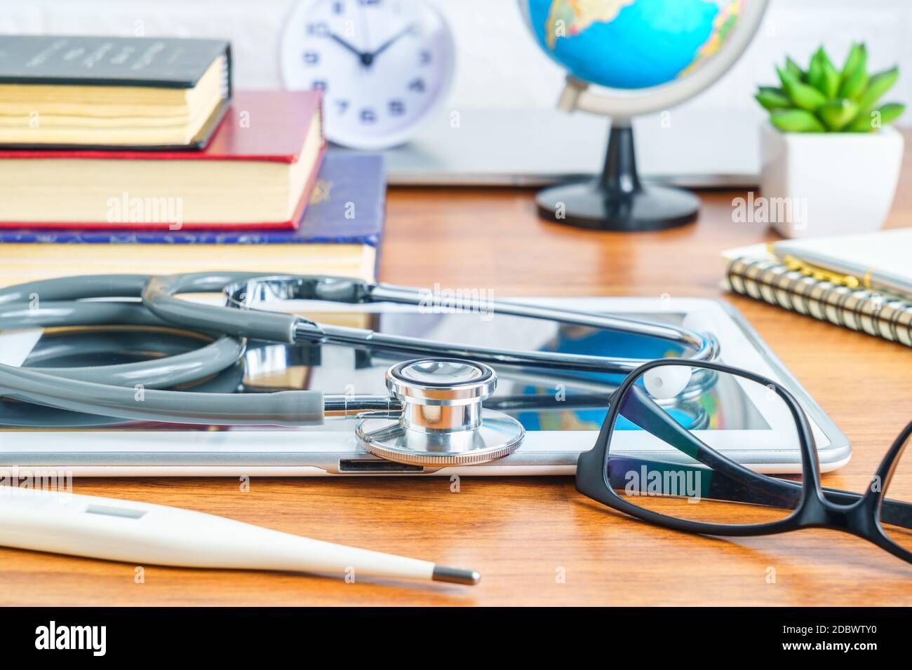 Medical stethoscope for doctor checkup with tablet computer on doctor ...