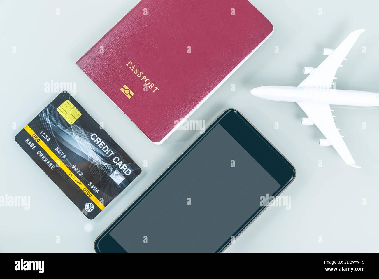 Smart phone, passport, credit card, on white background, Traveling ...