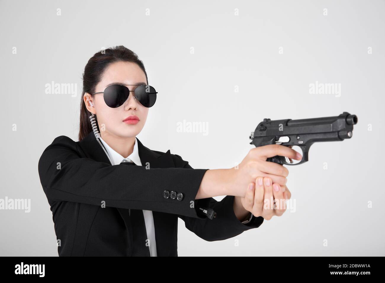 Asian male and female two security guards 090 Stock Photo - Alamy