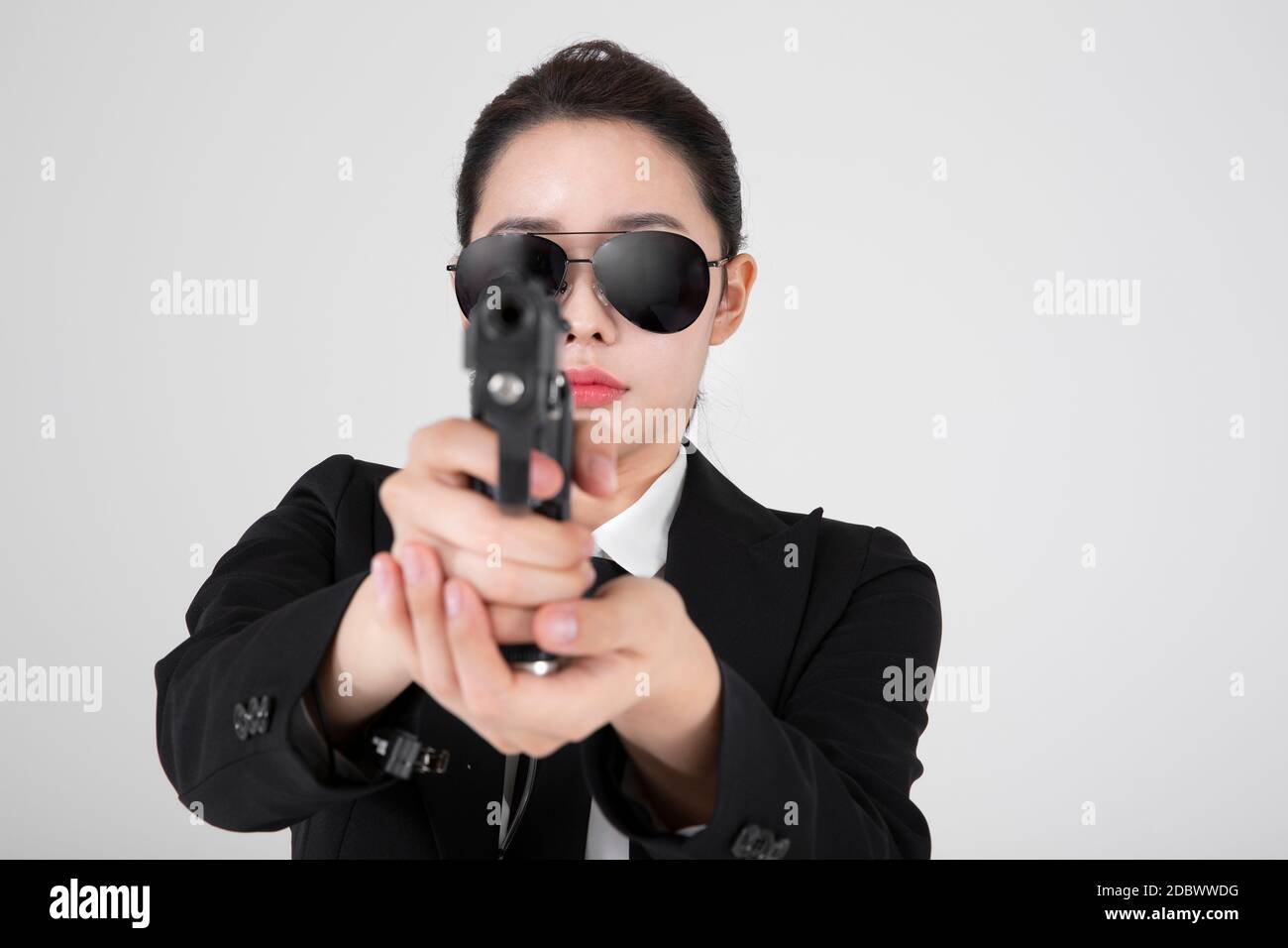Asian male and female two security guards 091 Stock Photo - Alamy