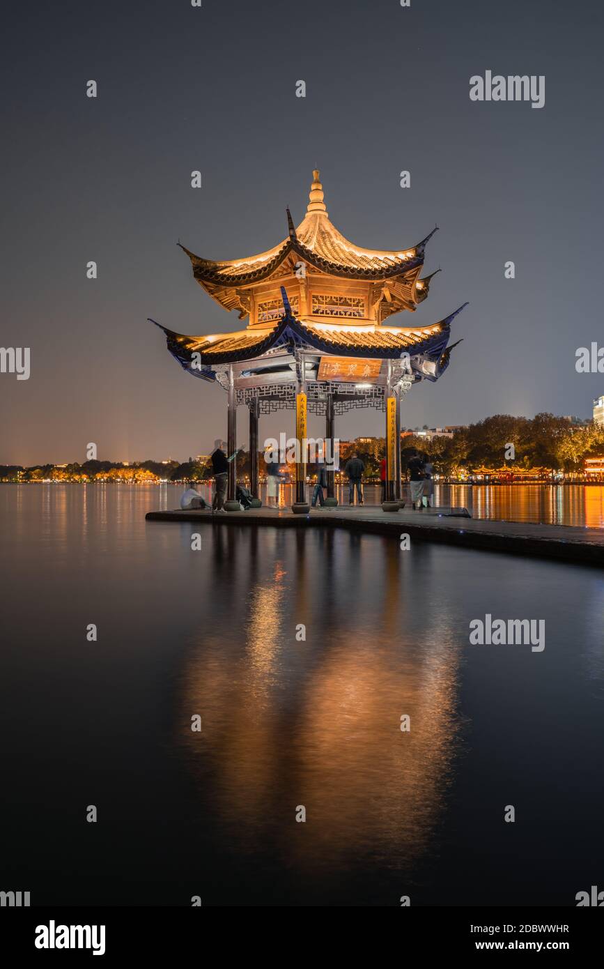 Night view of Jixian pavilion, the landmark at the West Lake in ...