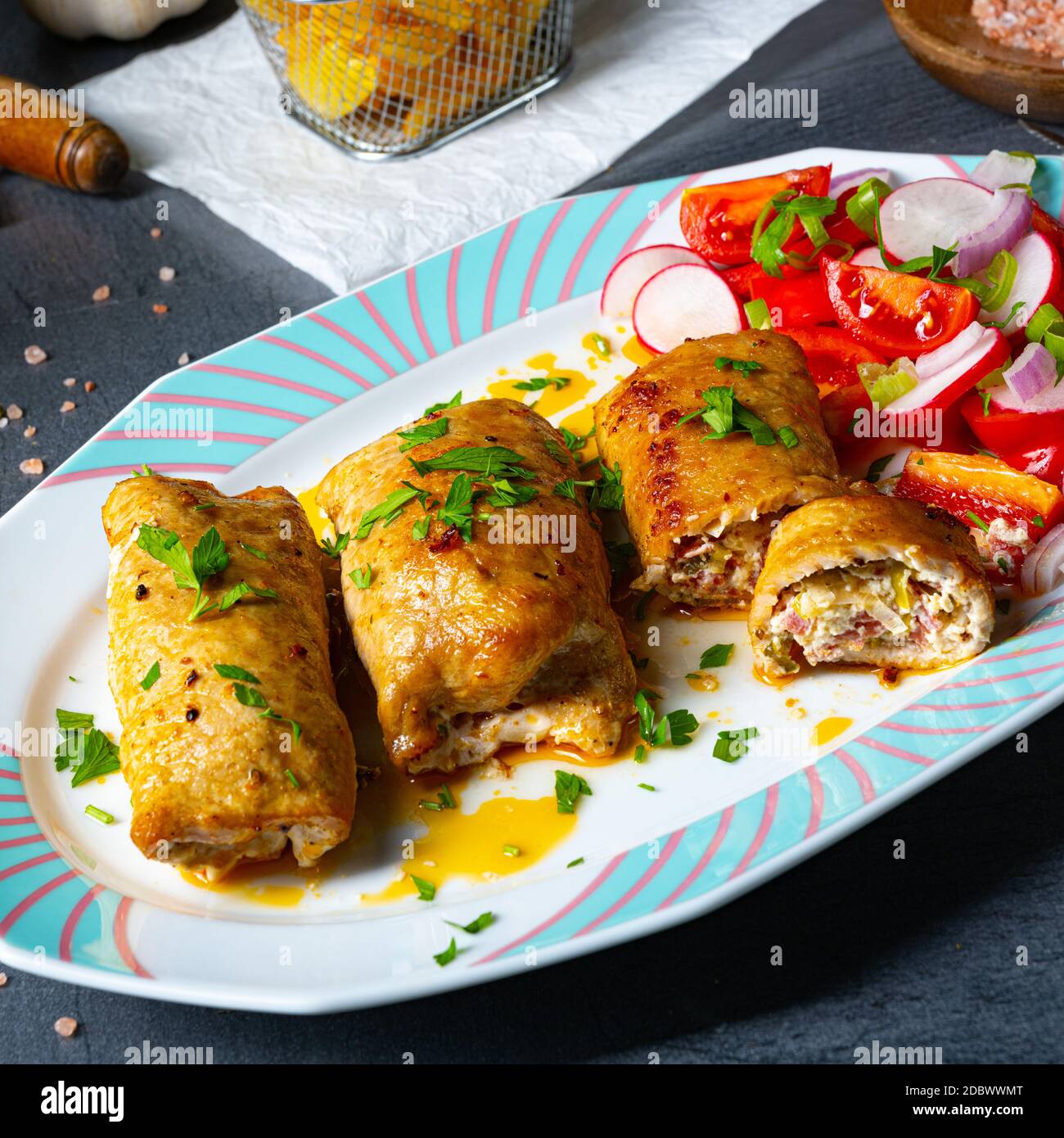 Vegetable roulade from roast pork loins with salads Stock Photo - Alamy