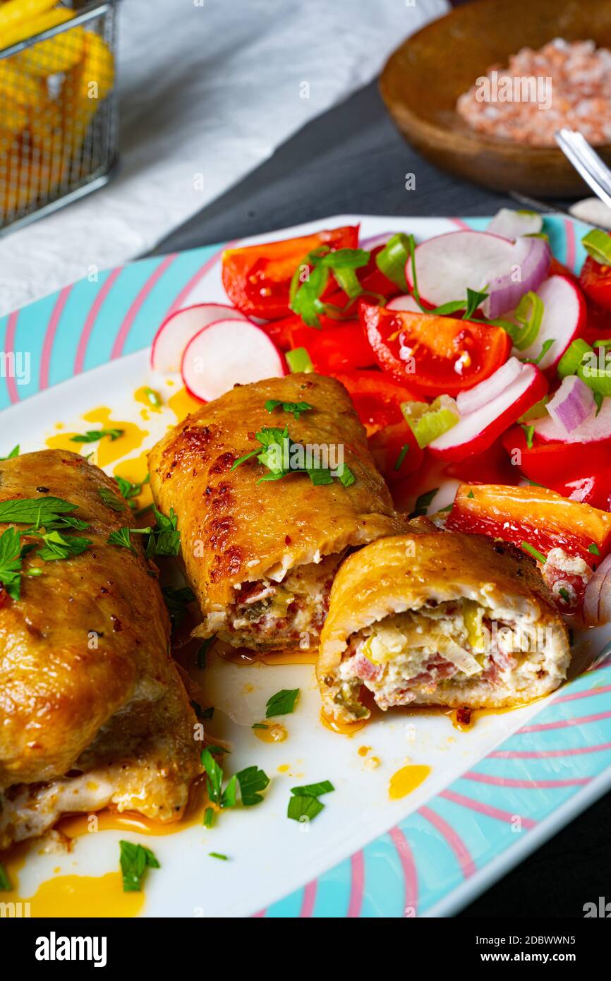 Vegetable roulade from roast pork loins with salads Stock Photo - Alamy