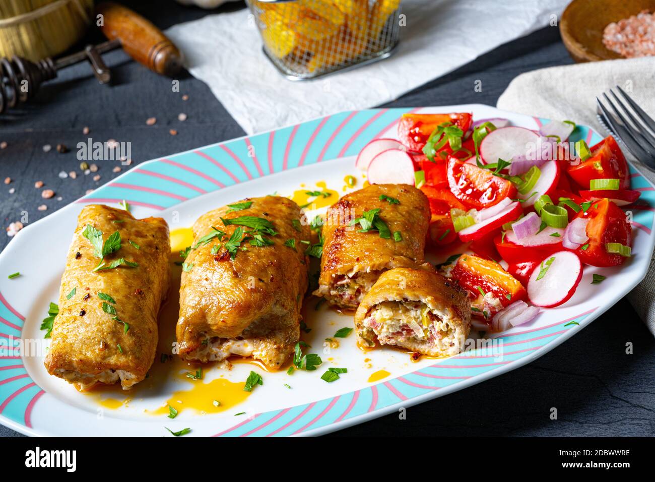 Vegetable roulade from roast pork loins with salads Stock Photo - Alamy