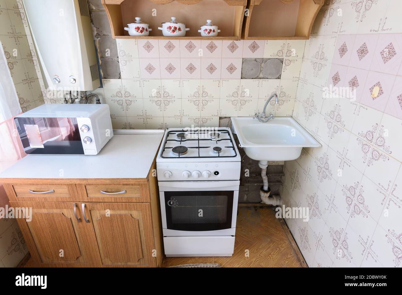 Old kitchen set in the interior of the kitchen in need of repair Stock ...