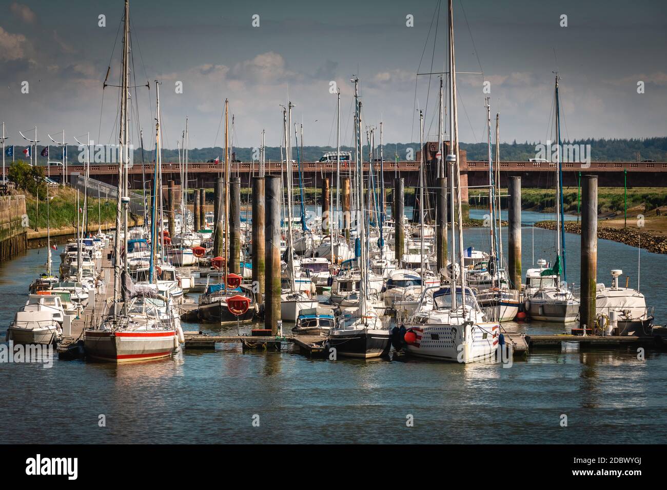 Boats in marina in France with blue sky. Etaples in France Stock Photo ...