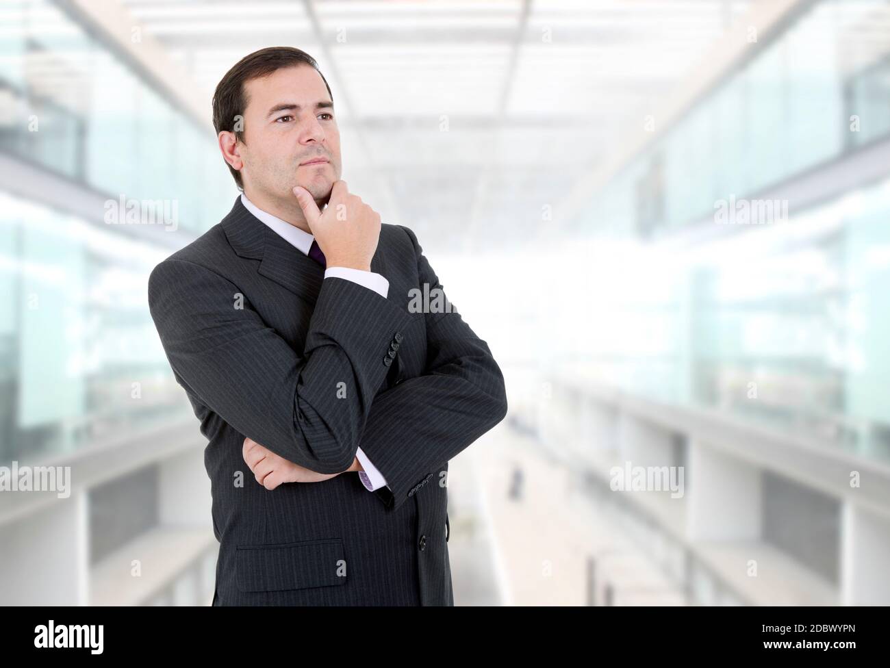 young business man thinking at the office Stock Photo - Alamy