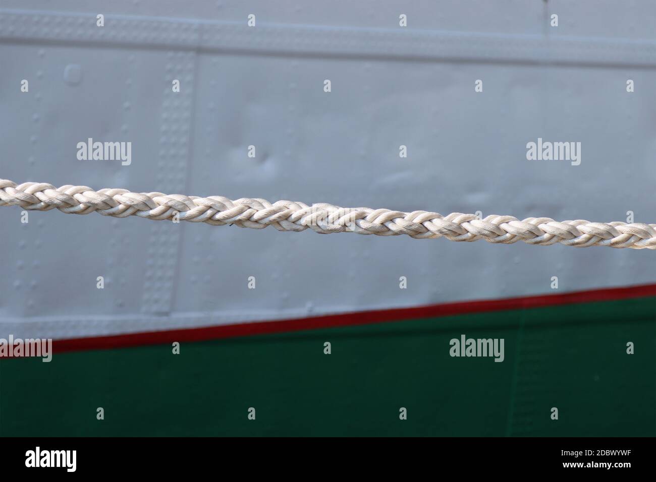 Board of the ship with a stretched rope Stock Photo - Alamy