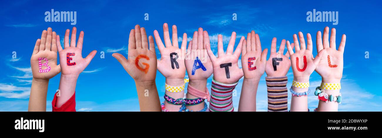 Children Hands Building Colorful English Word Be Grateful. Blue Sky As ...