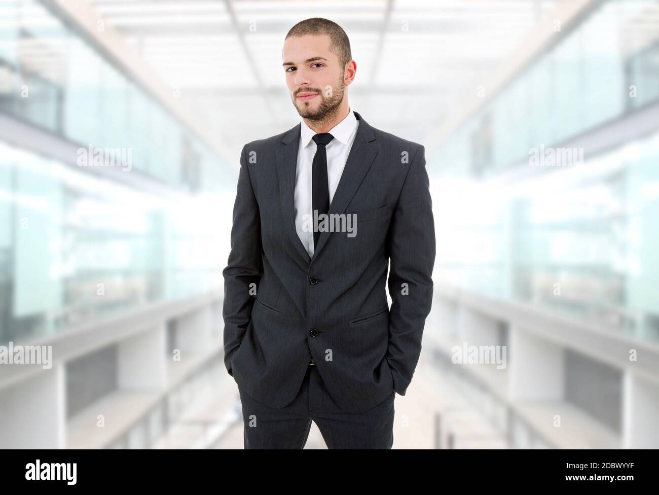 happy young business man at the office Stock Photo - Alamy