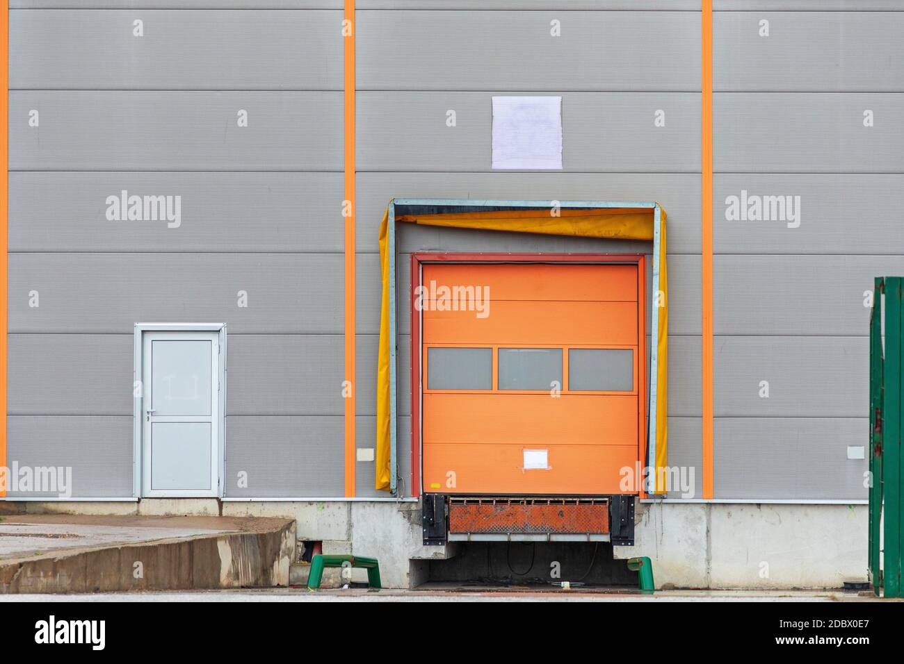 Loading Cargo Dock Door at Distribution Warehouse Stock Photo - Alamy