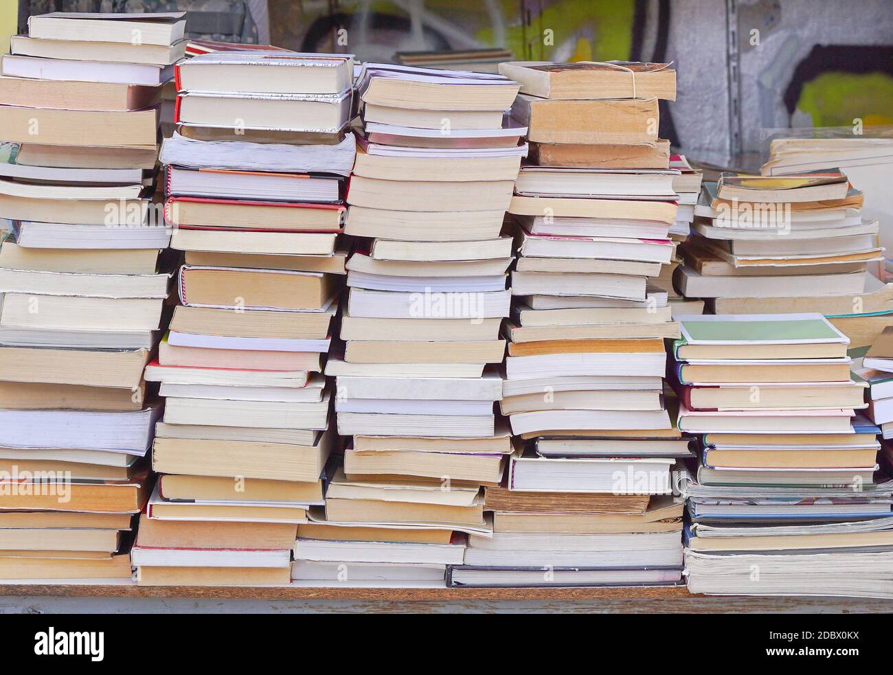 Big pile of books at flea market stall Stock Photo - Alamy