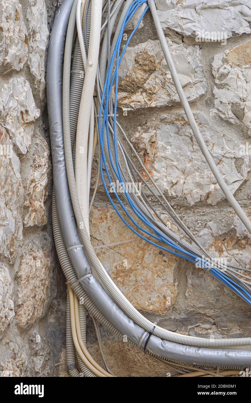 Cables and wires for network signal and electricity Stock Photo - Alamy