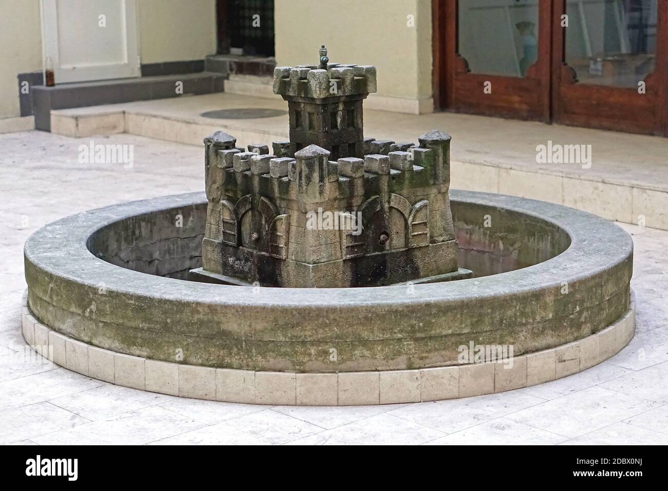 Round fountain in castle fortification shape Stock Photo - Alamy