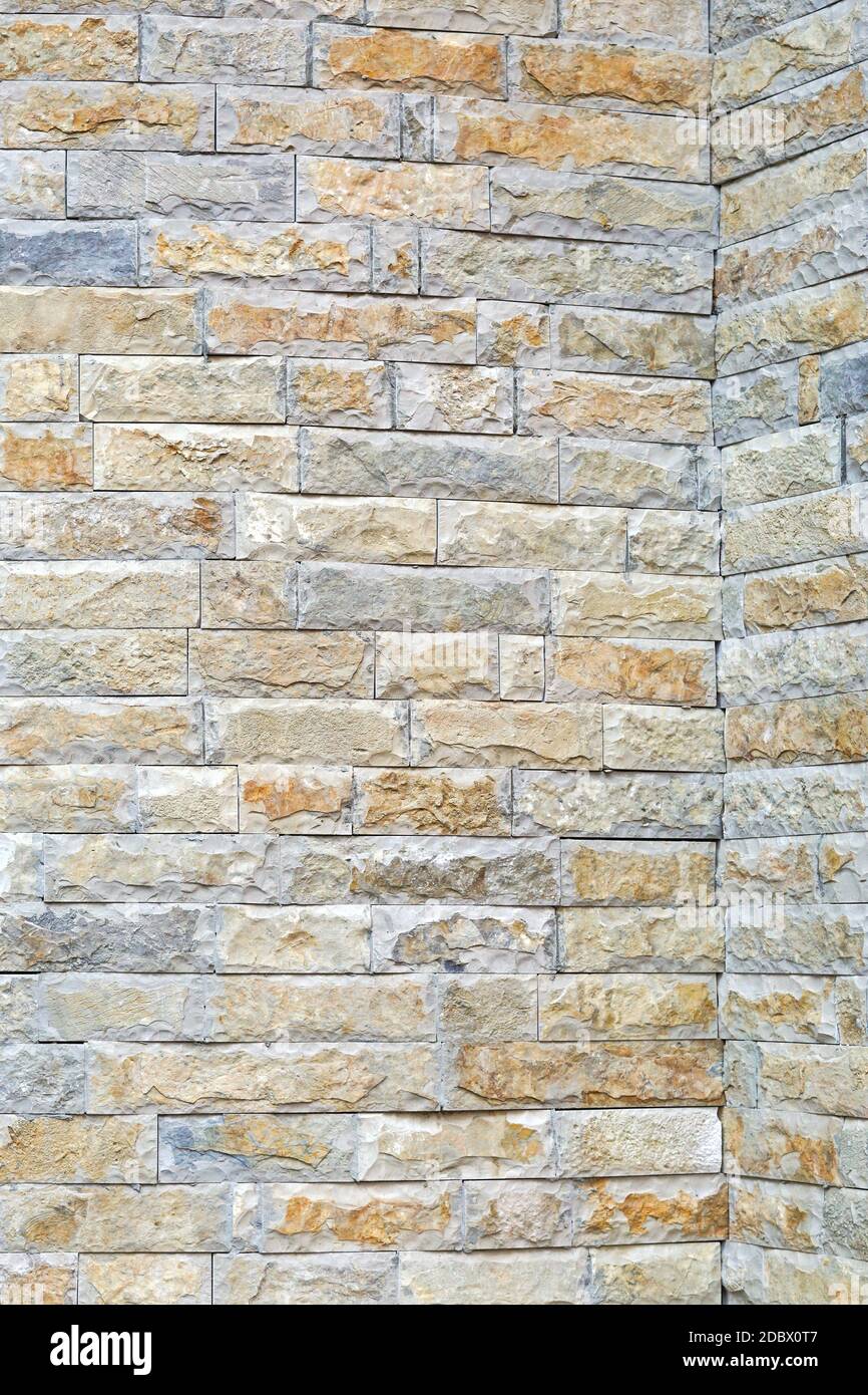Stone tiles with rough surface at house wall Stock Photo - Alamy