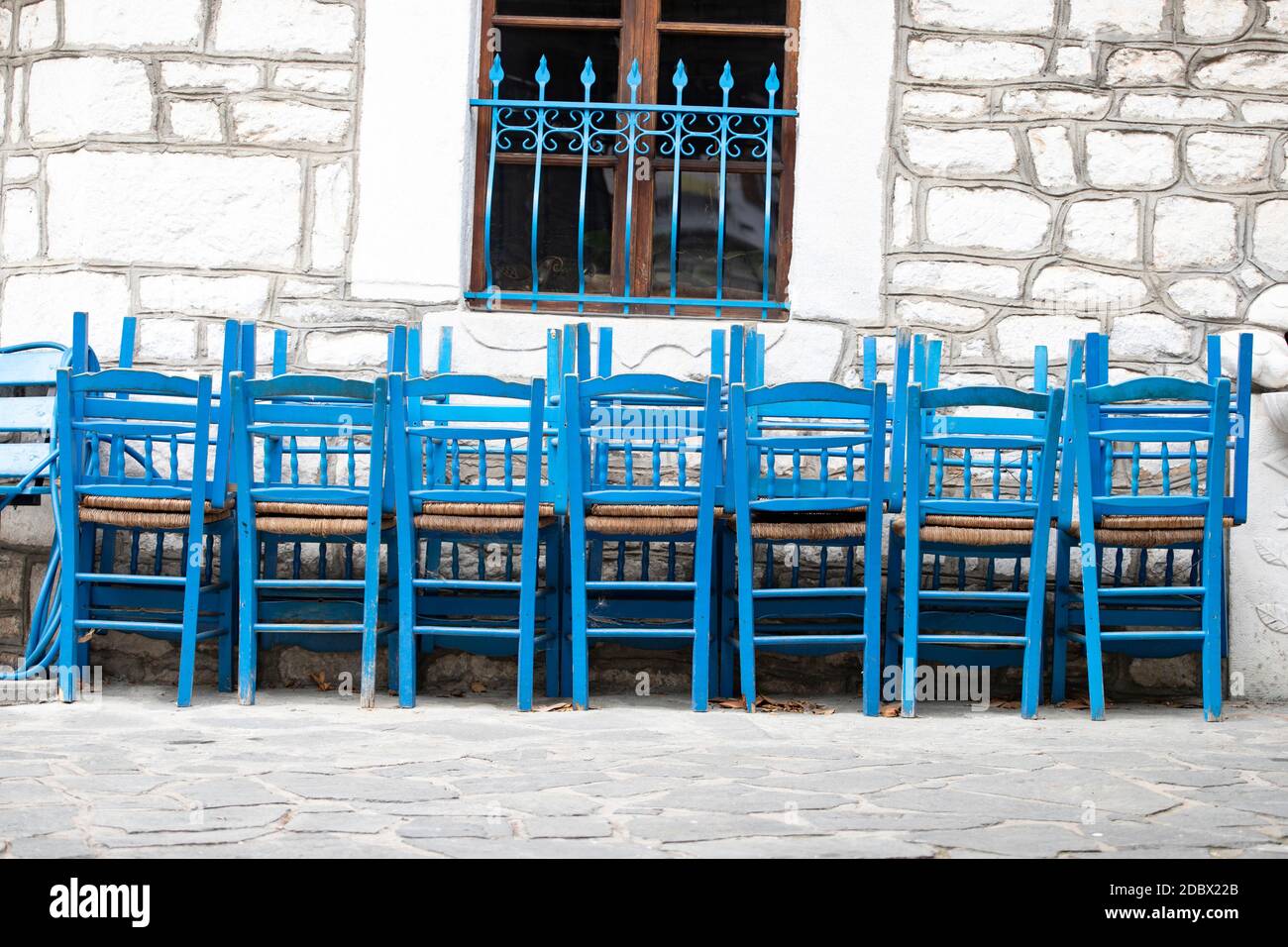 Greek specific - Traditional blue windows and chairs in Thassos island ...