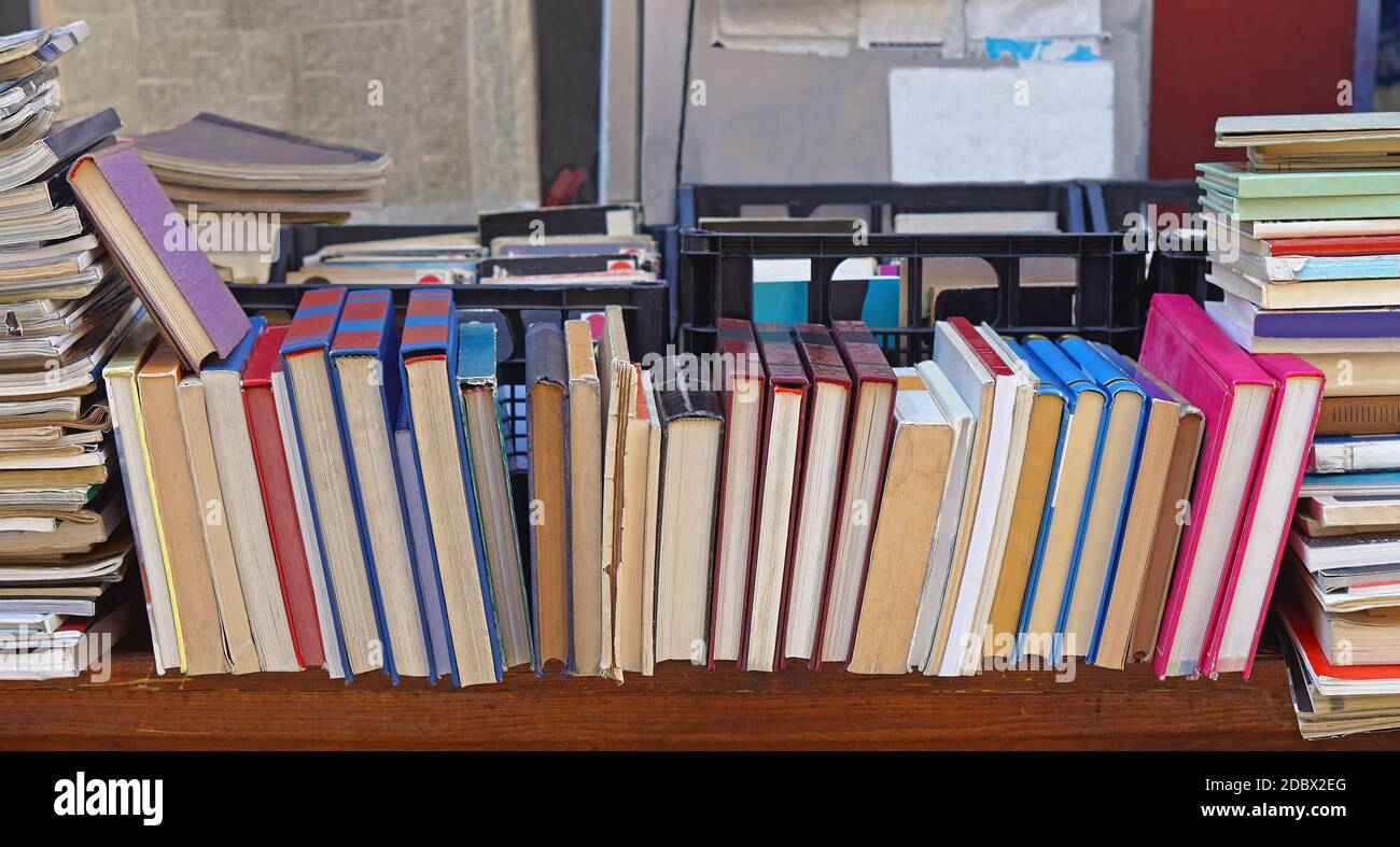 Second hand books at flea market stall Stock Photo - Alamy