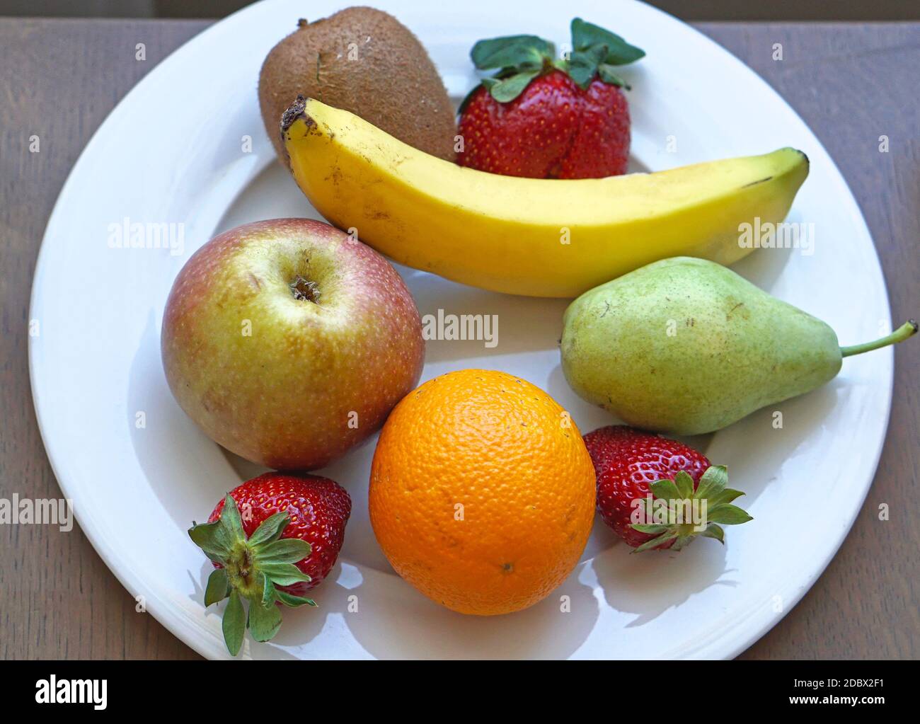 Mix of fresh fruits served at platter Stock Photo - Alamy