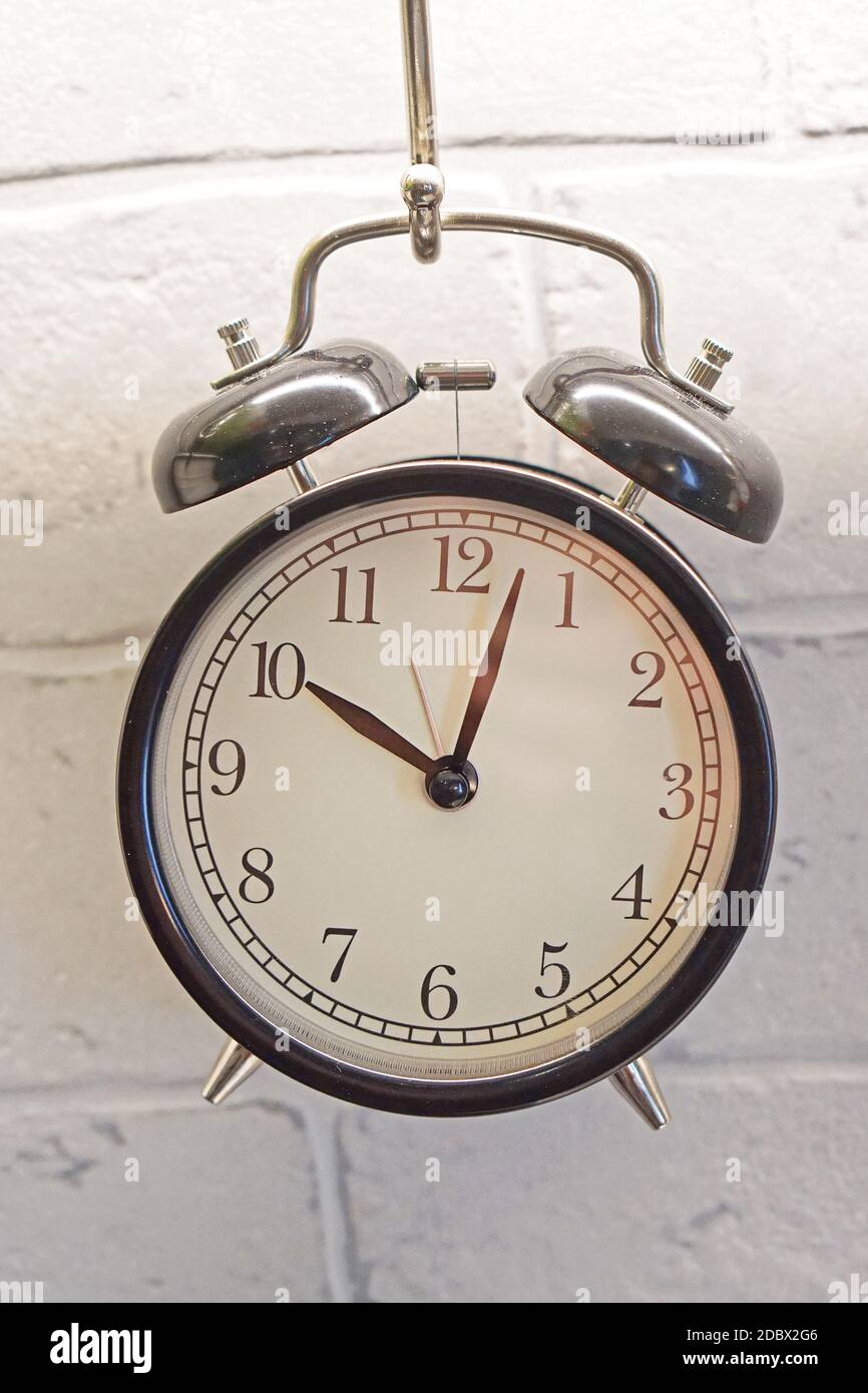 Big old analog alarm clock with bells Stock Photo - Alamy