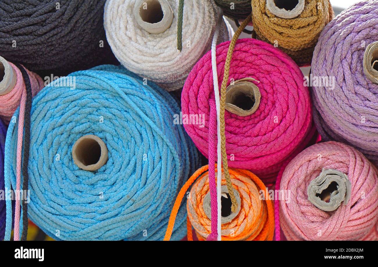 Various color ropes and yarns on coils Stock Photo - Alamy