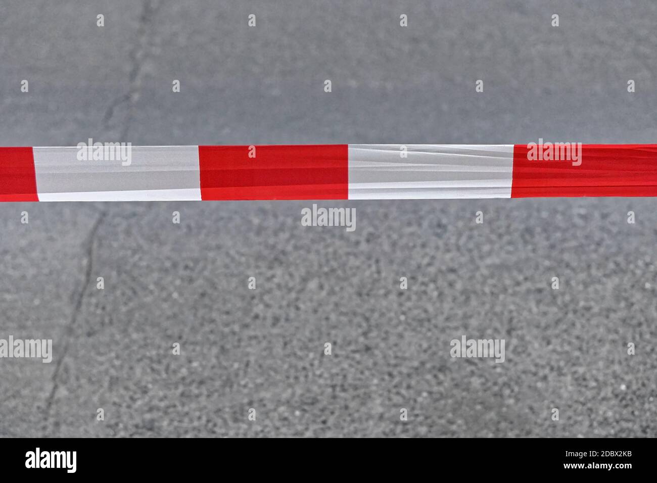 Red and white safety tape line Stock Photo - Alamy