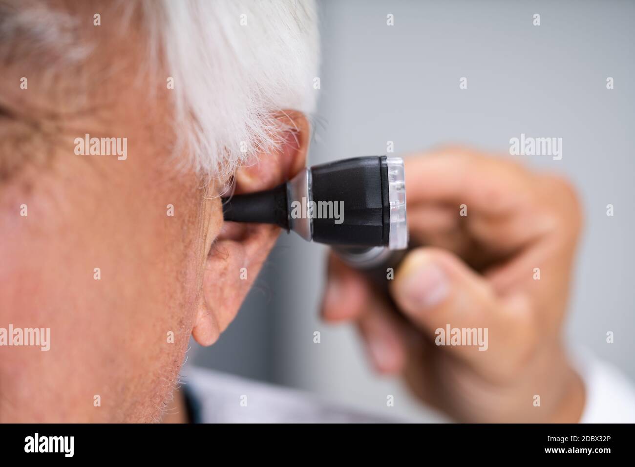 Doctor Checking Ear High Resolution Stock Photography and Images - Alamy