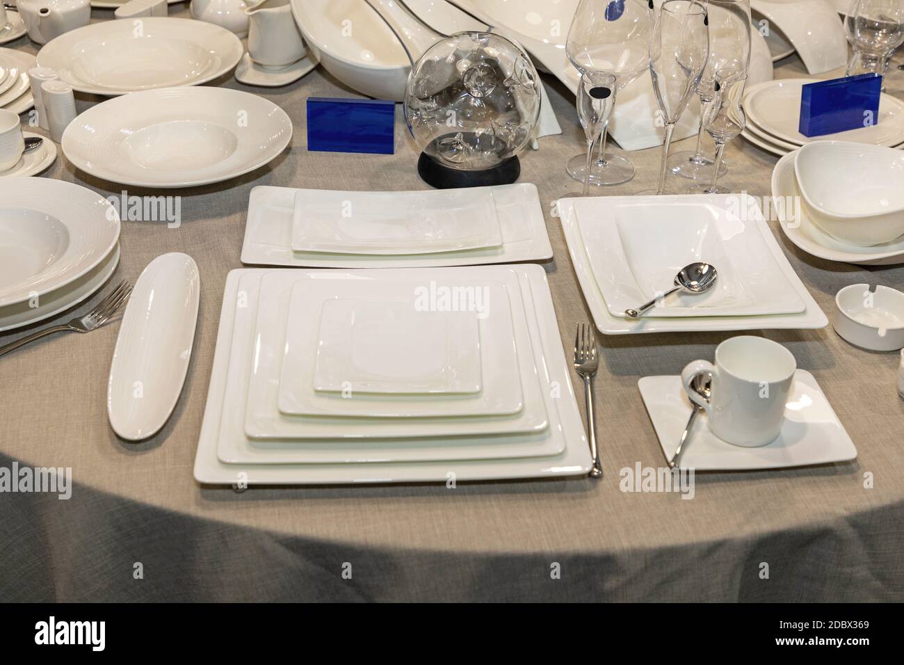 Square Shape Plates at Dining Table Setup Stock Photo - Alamy