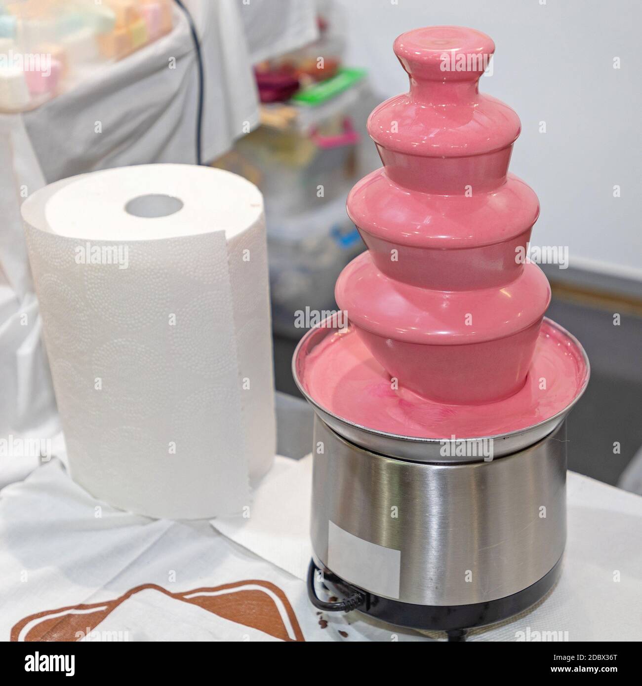 Pink Chocolate Fondue Fountain Multi Layer Tower Stock Photo - Alamy