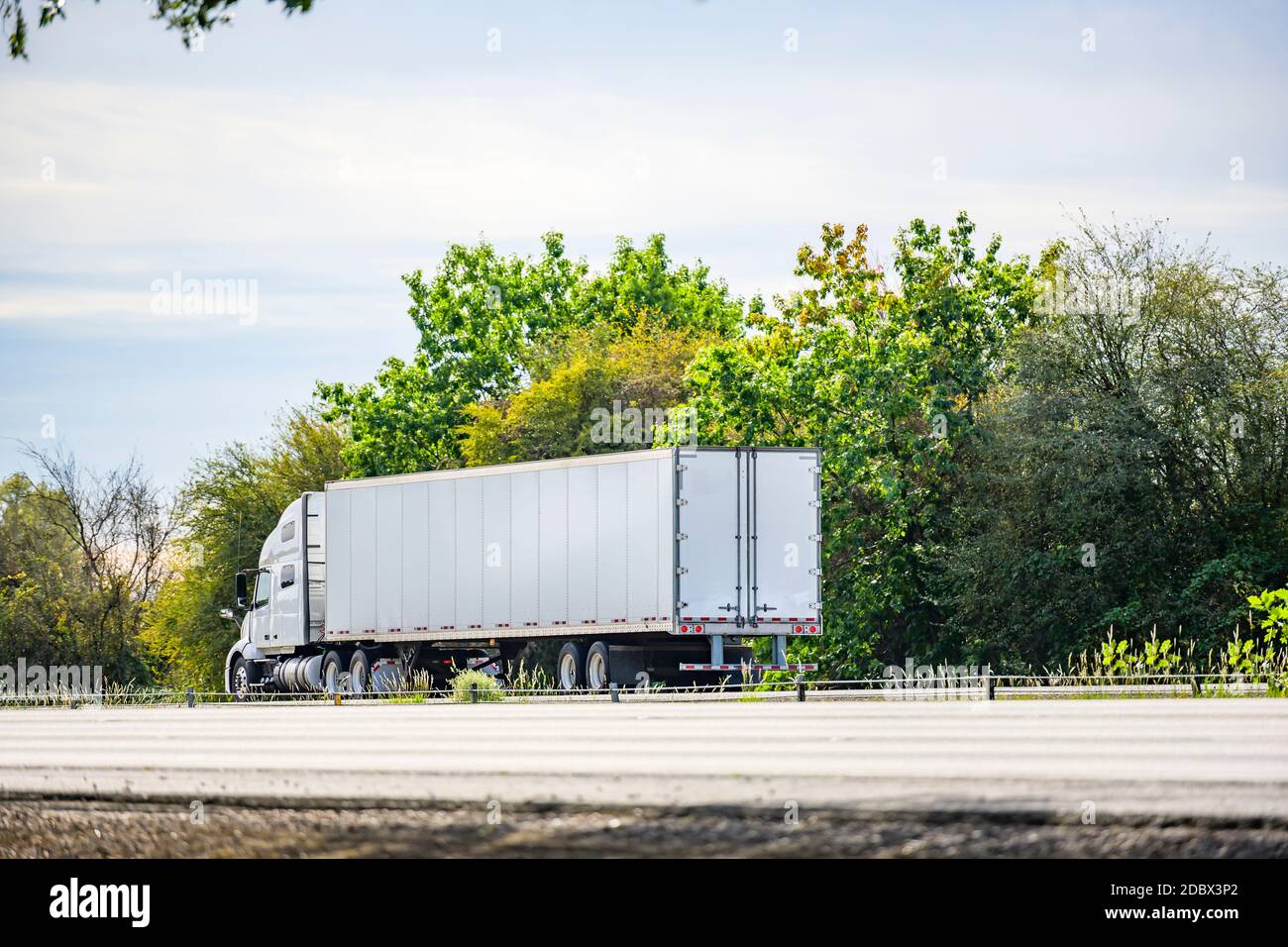 Big rig white long haul industrial semi truck tractor with sleeper cab ...