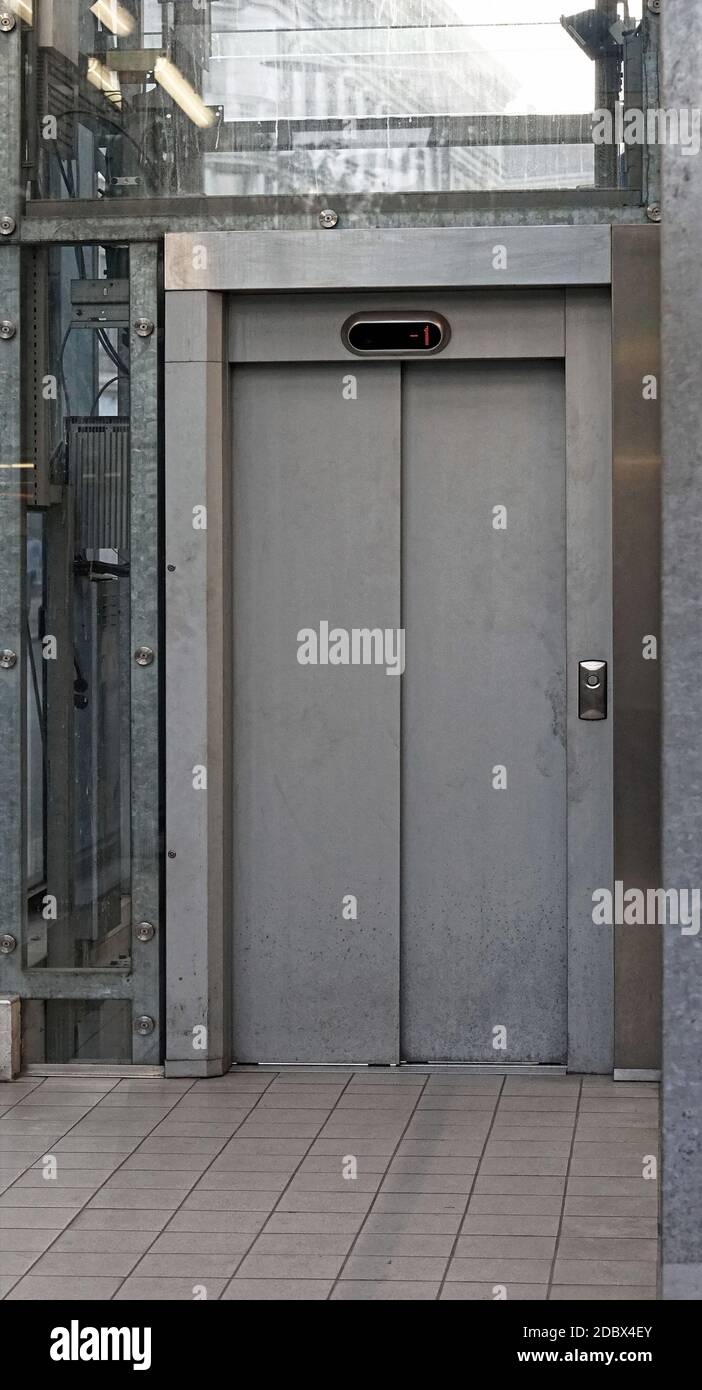 Building entrance corridor with lift Stock Photo - Alamy