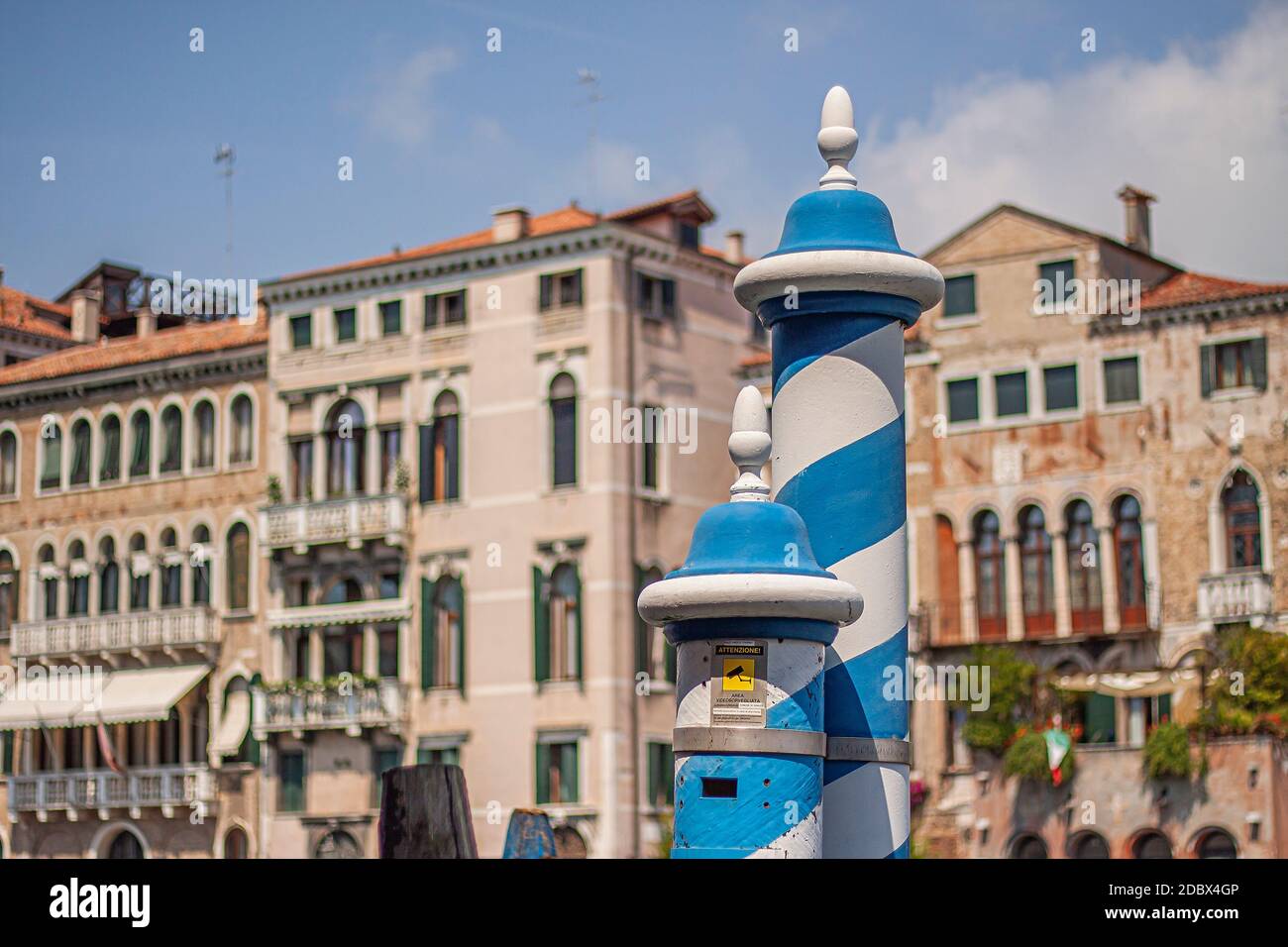 Blue and white Colored pole in Venice, a symbol of Venice Stock Photo ...