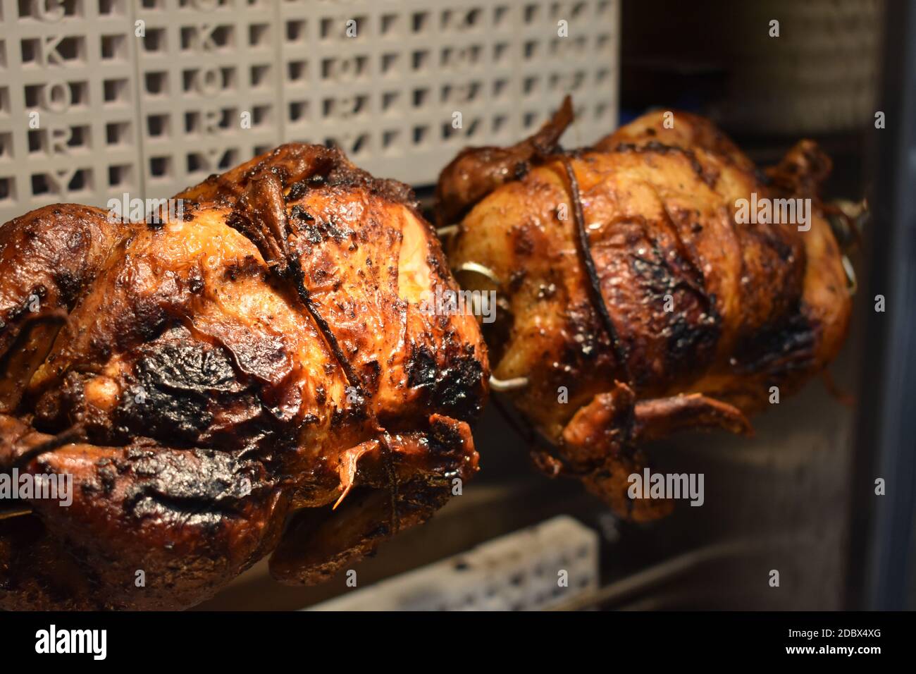 Fresh Cooked Rotisserie Chicken Still Rotating Inside the Rotisserie ...