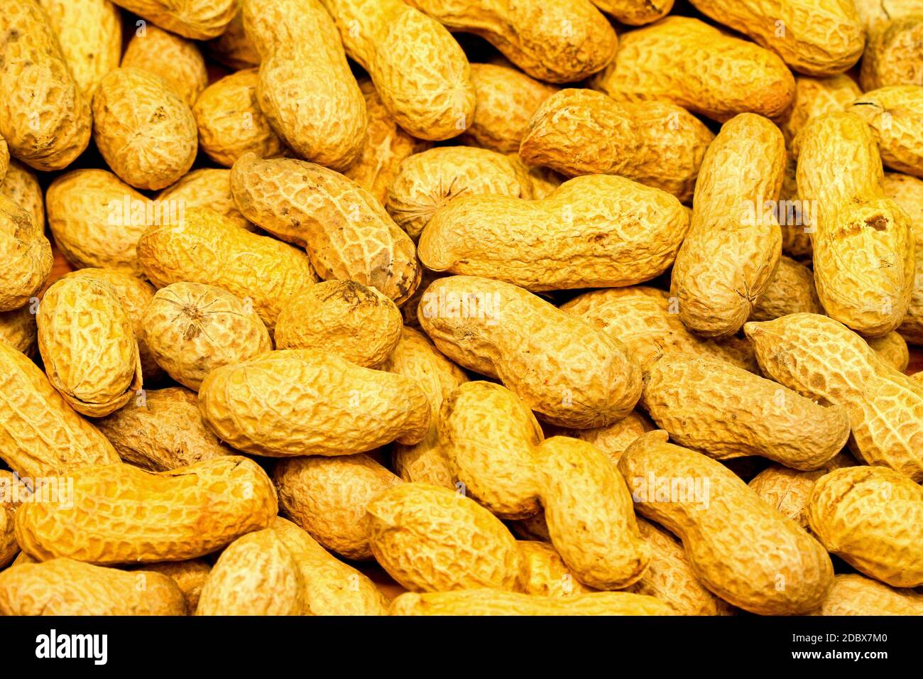 Natural organic raw peanuts in shell texture Stock Photo - Alamy