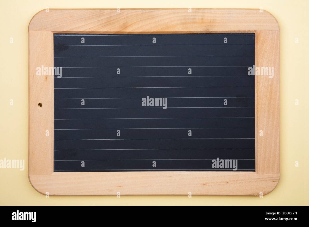 Decorative Blackboard with lines on yellow background Stock Photo - Alamy