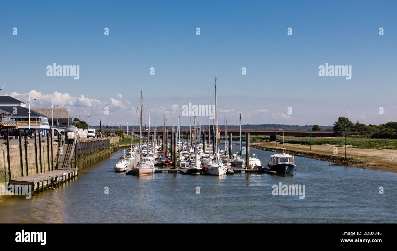 Boats in marina in France with blue sky. Etaples in France Stock Photo ...