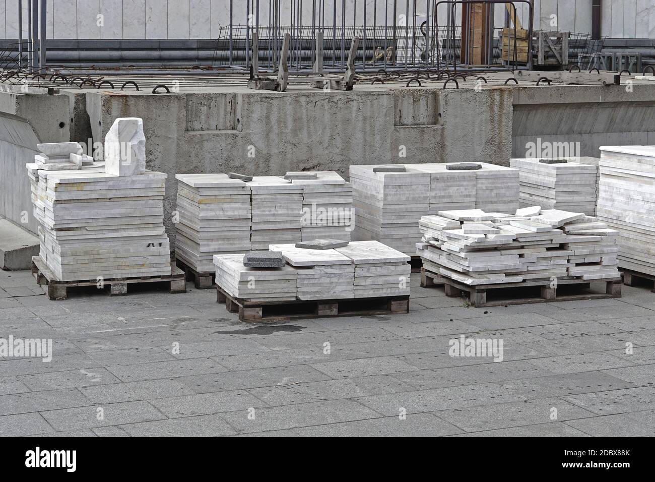Marble tiles on pallets at construction site Stock Photo - Alamy