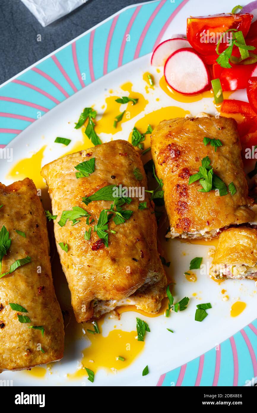 Vegetable roulade from roast pork loins with salads Stock Photo - Alamy
