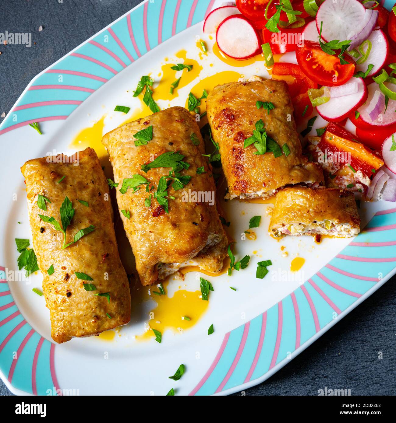 Vegetable roulade from roast pork loins with salads Stock Photo - Alamy