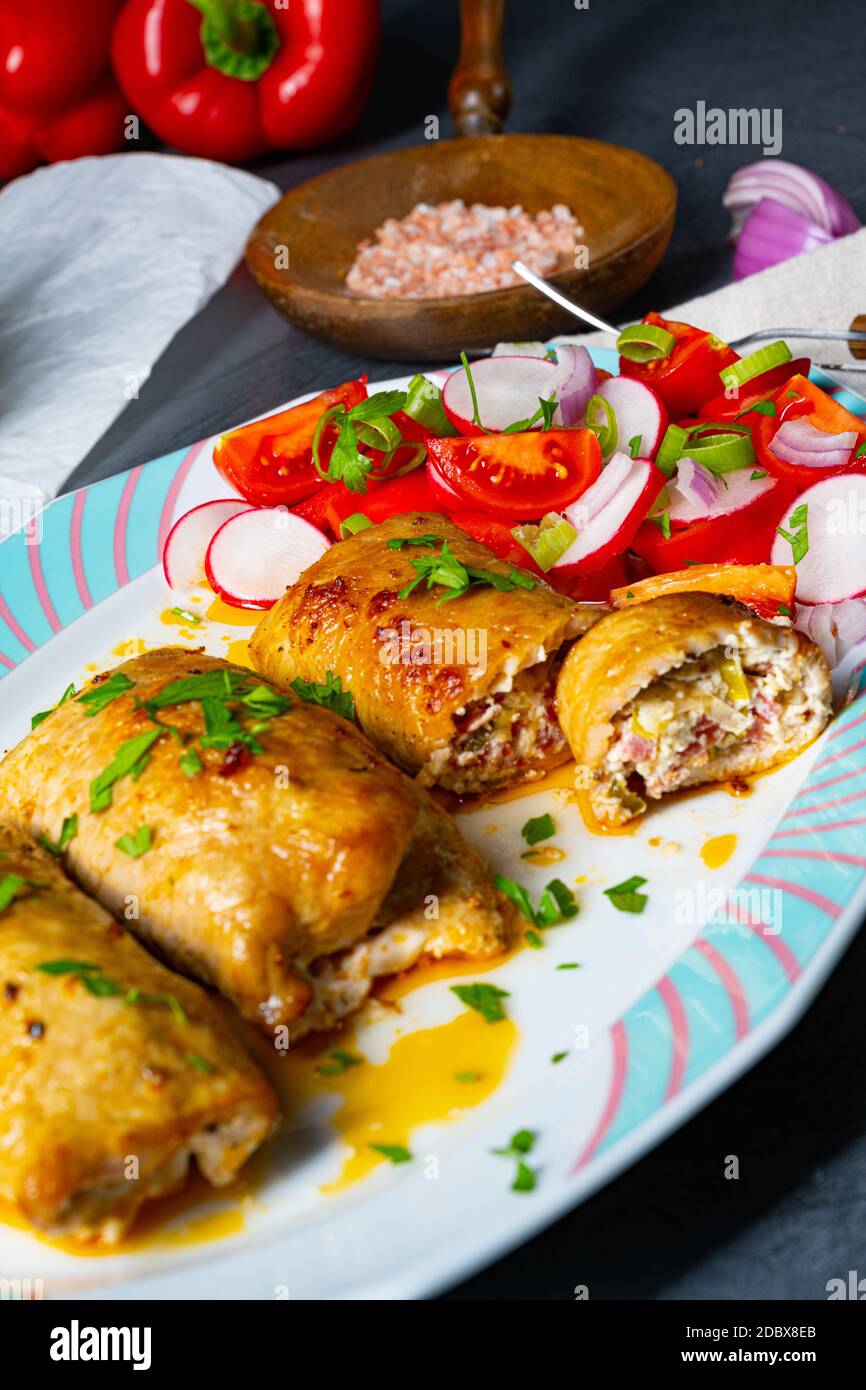 Vegetable roulade from roast pork loins with salads Stock Photo - Alamy