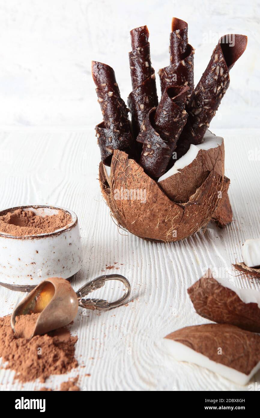 The chocolate pastille is rolled into a tube and stuck in a coconut ...
