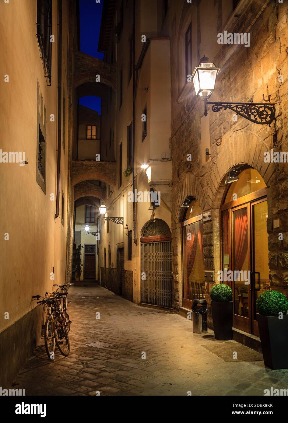 Small empty street in Florence, Italy at night Stock Photo - Alamy