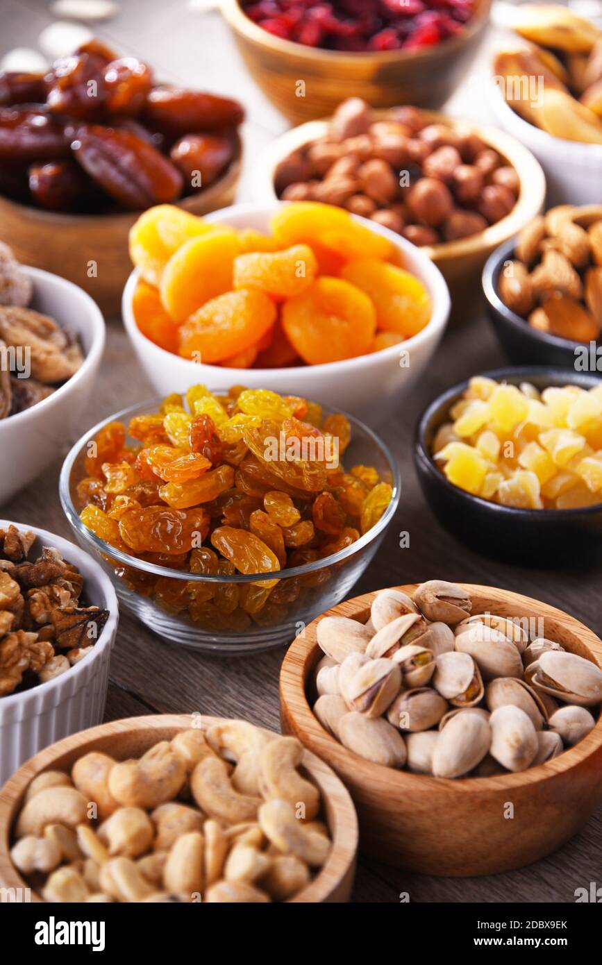 Composition with dried fruits and assorted nuts. Delicacies Stock Photo ...
