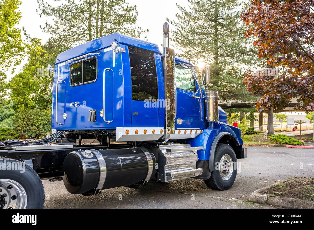 Powerful shiny big rig semi truck tractor in blue with painted aluminum ...