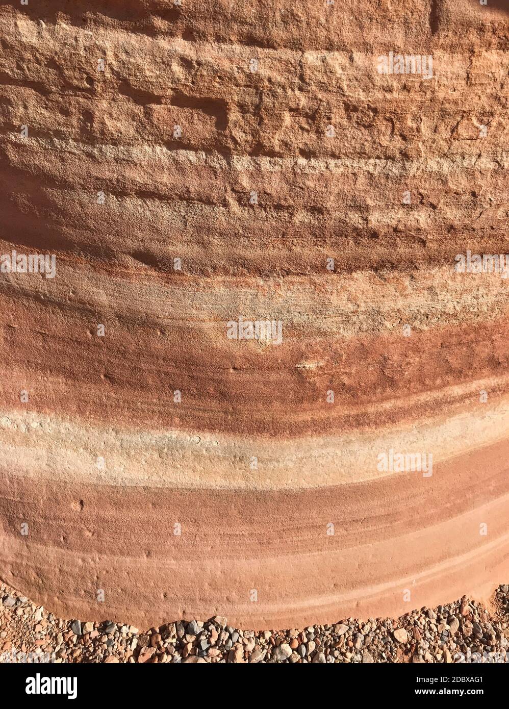 A brown rock with different layers of rock in different colours Stock ...