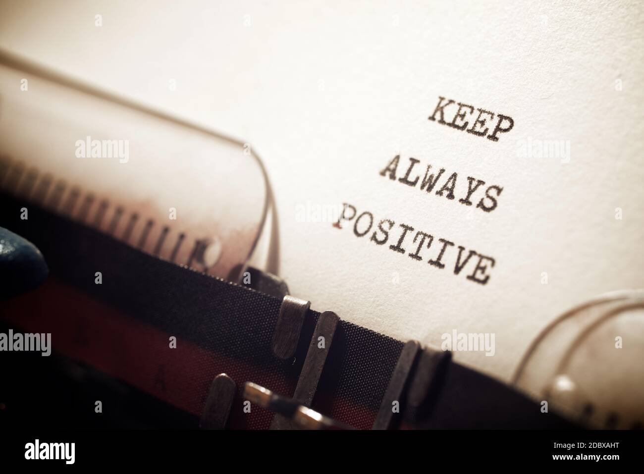 Keep always positive phrase written with a typewriter Stock Photo - Alamy