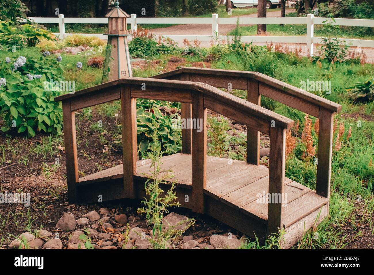 A Small Decorative Wooden Bridge in a Garden Stock Photo - Alamy