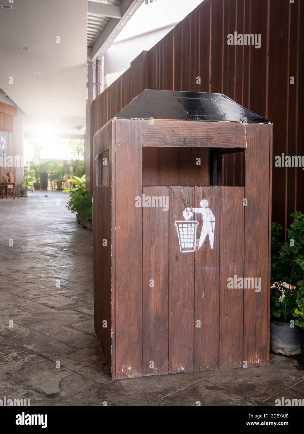 Vintage Wood trash bin design to prevent be wet from rain Stock Photo ...