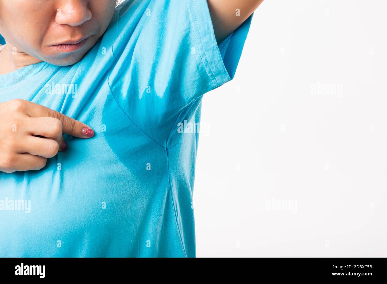 Woman hyperhidrosis sweating hi-res stock photography and images - Alamy